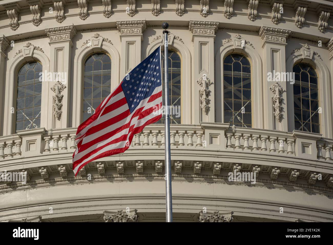 American Flag Flying at the US Capitol Building in Washington DC Stock ...