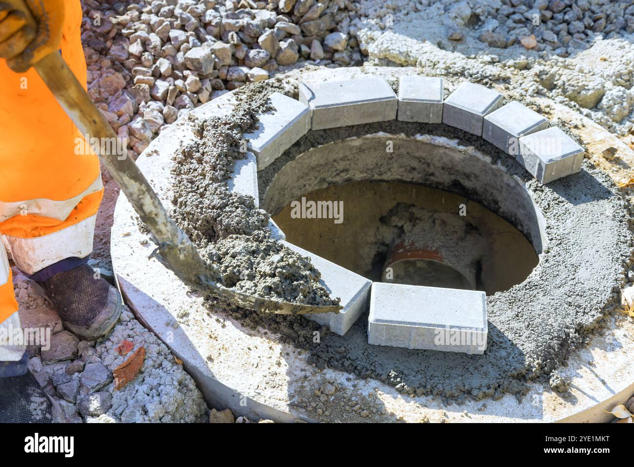 At concrete is being laid to anchor blocks completing upper edge of ...