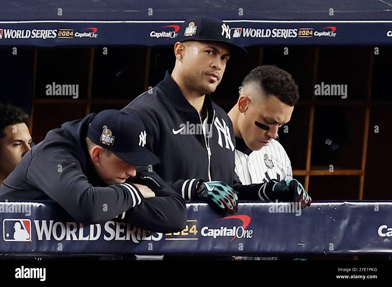 New York Yankees Giancarlo Stanton and Aaron Judge watch from the dugout as the Yankees trail ...