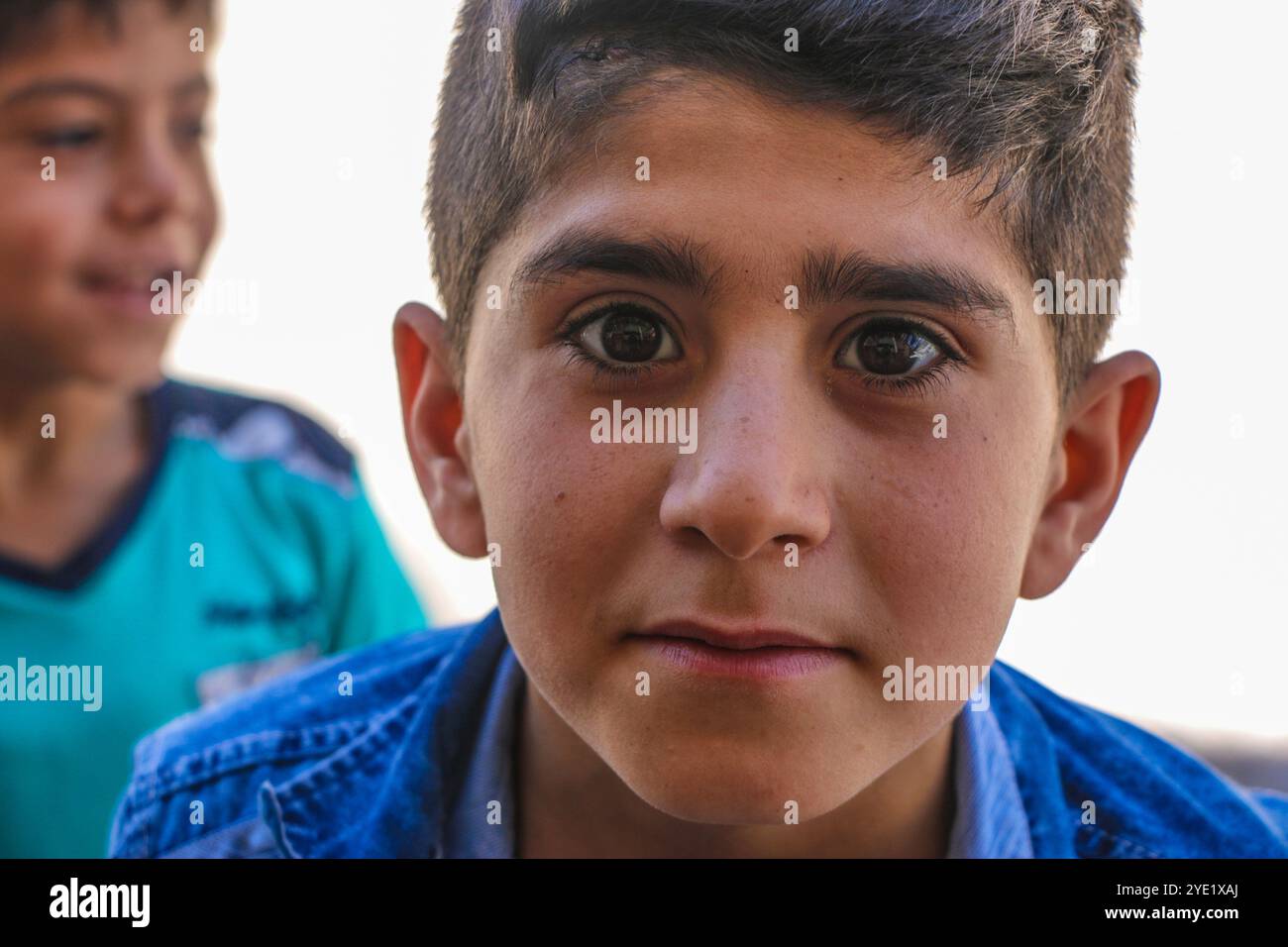 Syrian children living in a refugee camp in Turkey, near the city of ...