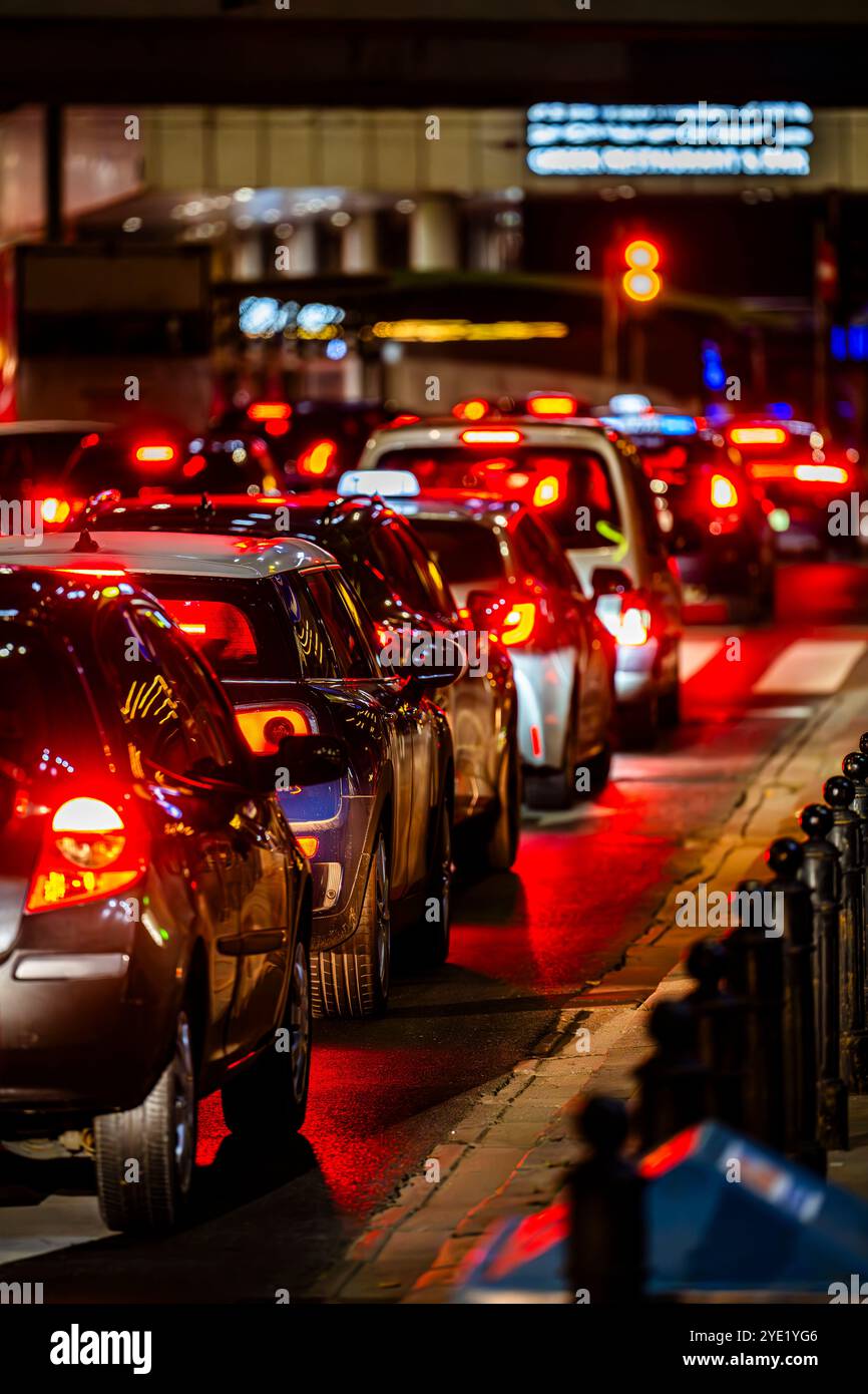 Cars waiting at a red light in a traffic jam Stock Photo - Alamy