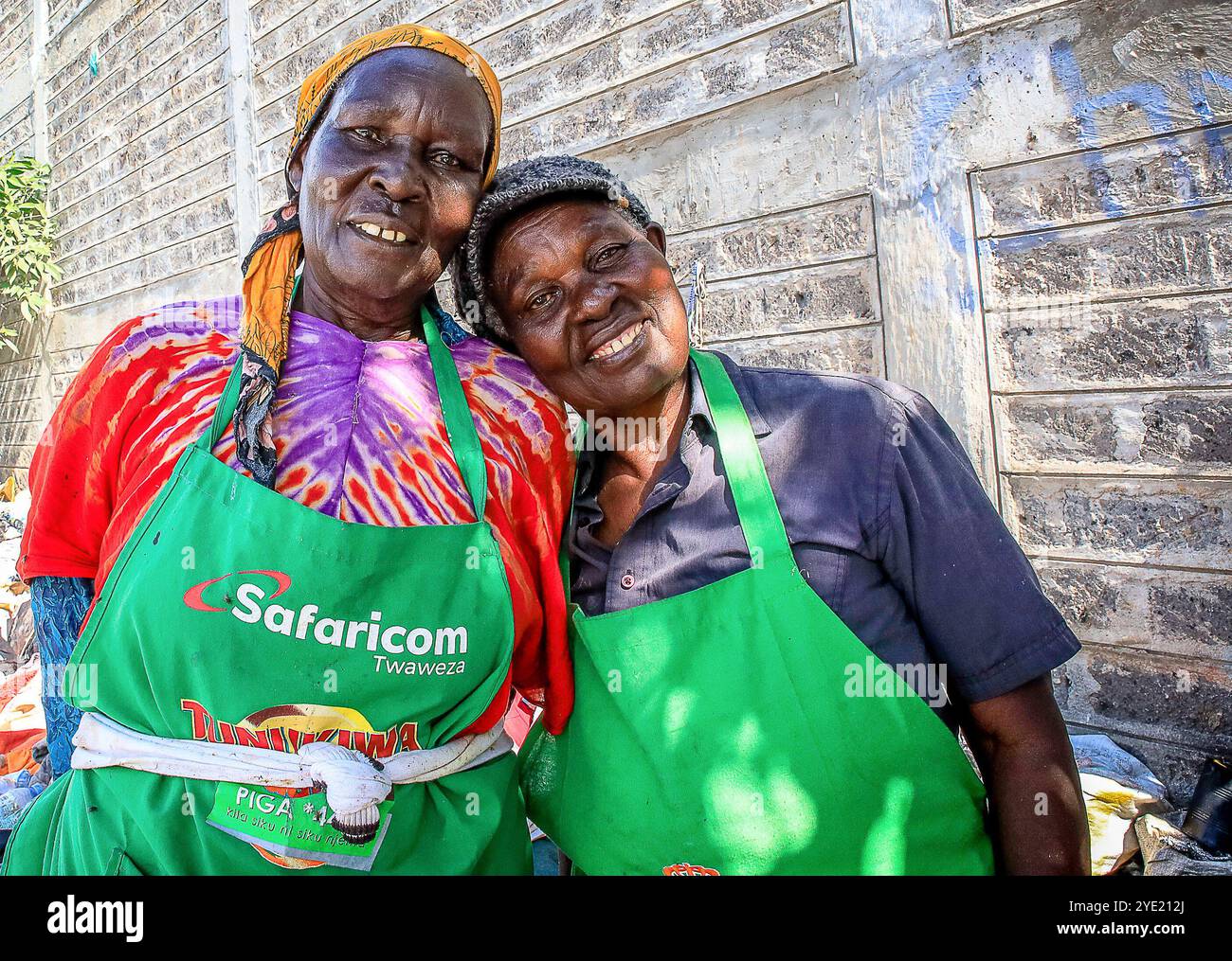 Nairobi, Kenya. 1st Oct, 2024. Two Waste collectors pose for a photo at ...