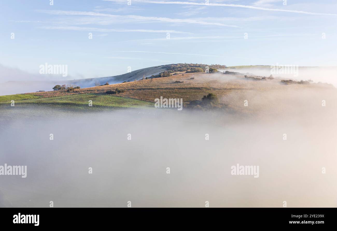 The crest of wilmington hill on the south downs east Sussex emerging ...