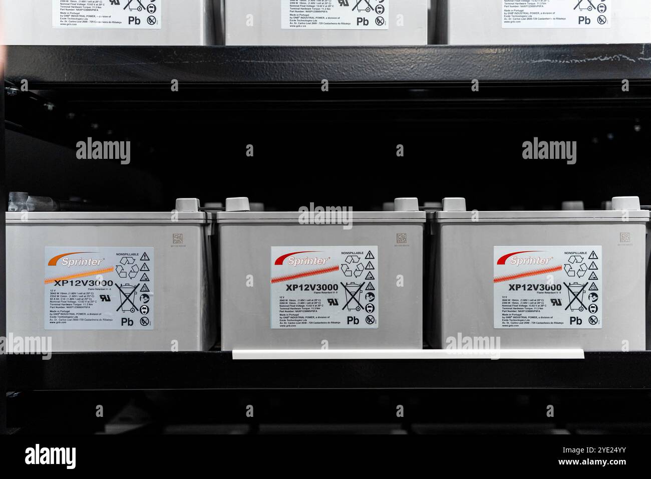 Illustration of rows of Sprinter brand batteries on a shelf during his ...