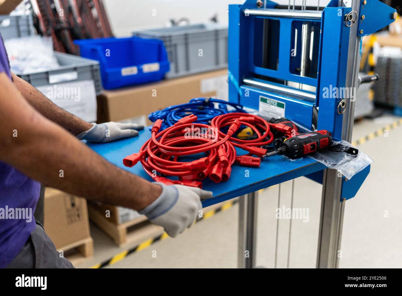 Illustration of a worker preparing cables to connect to data centers in ...