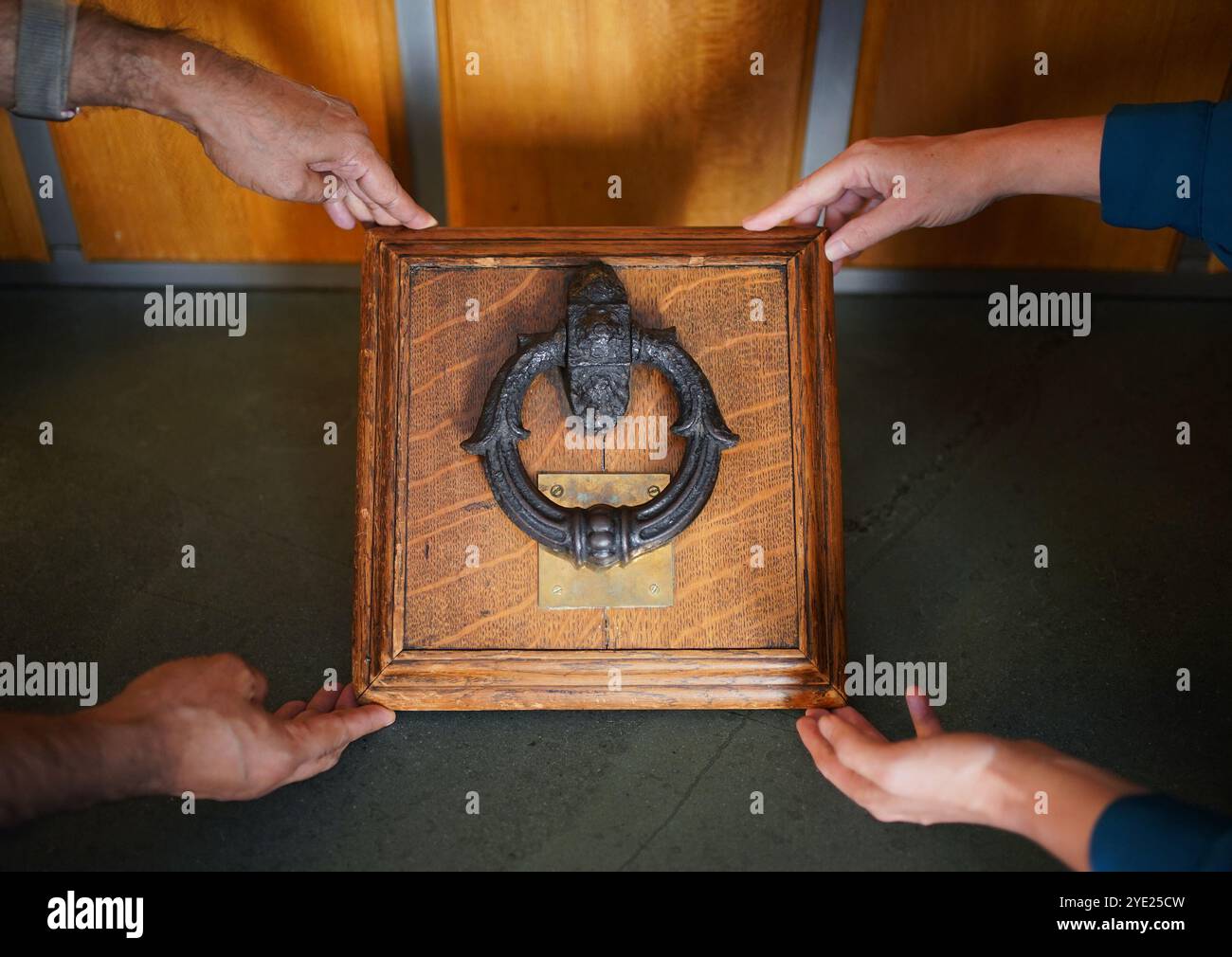 A door knocker taken from the door of Newgate Prison mounted on a ...