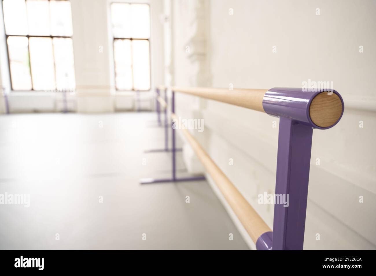 Studio with white walls and open space for ballet and yoga classes ...