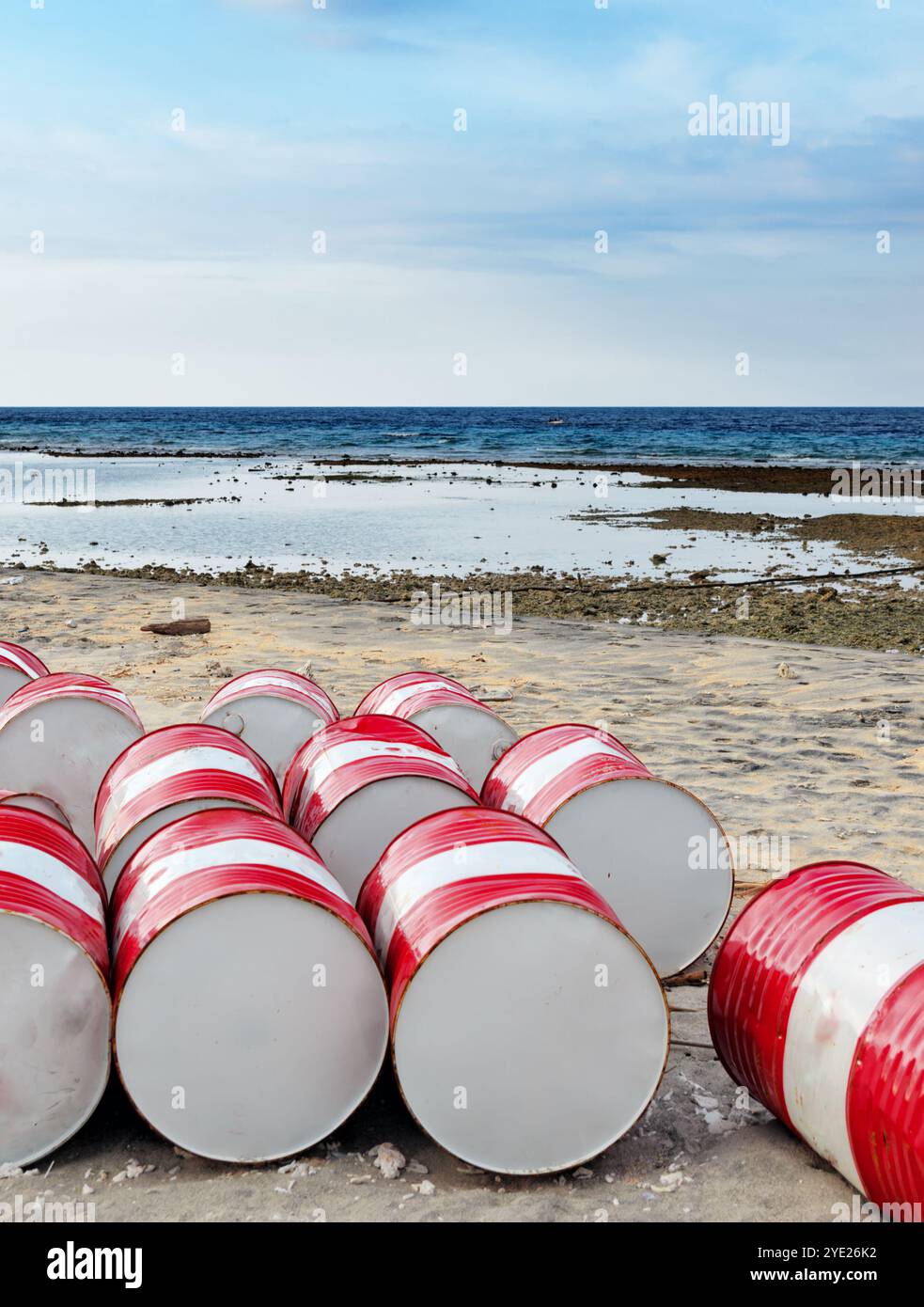 Lot of oil barrels on a seashore. Environment pollution Stock Photo - Alamy