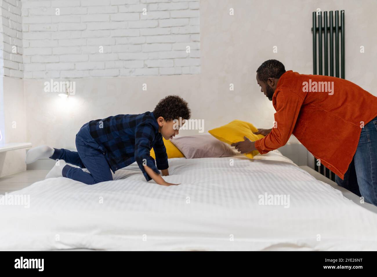 Kids making bed hi-res stock photography and images - Alamy