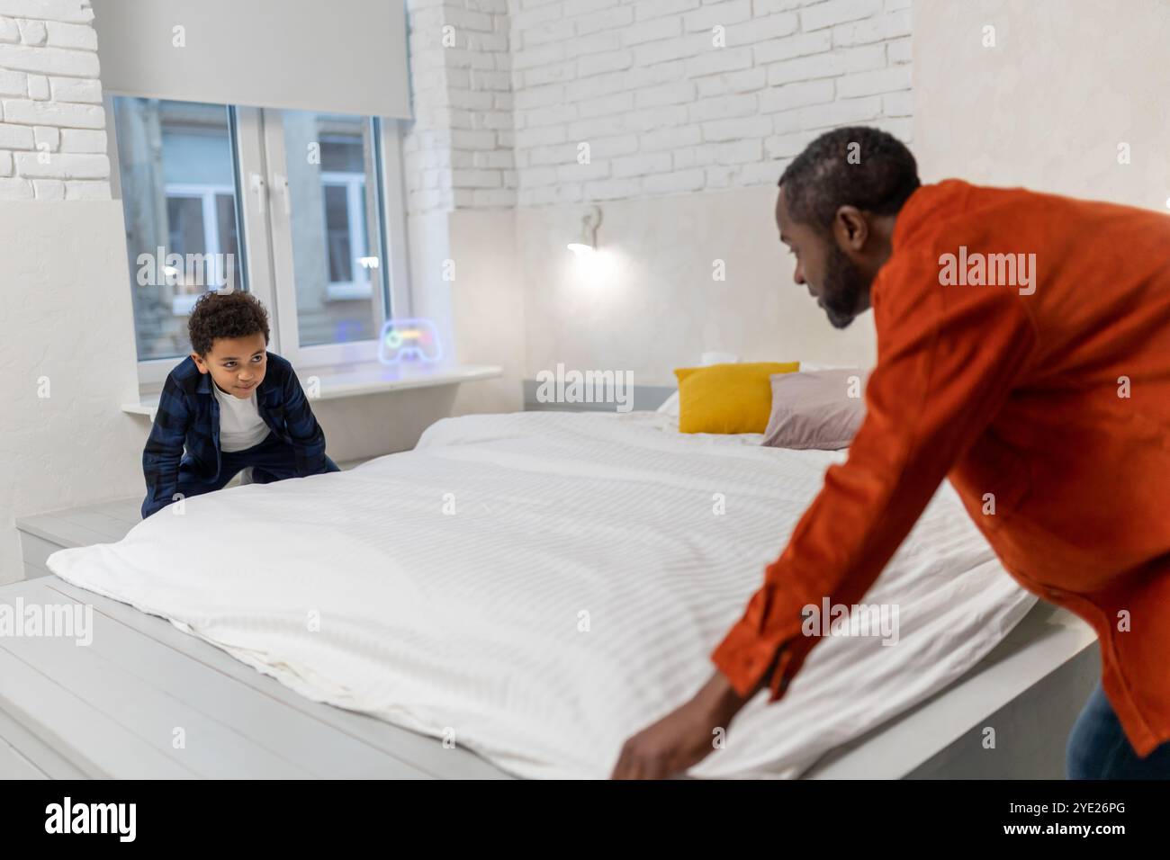 Kids making bed hi-res stock photography and images - Alamy