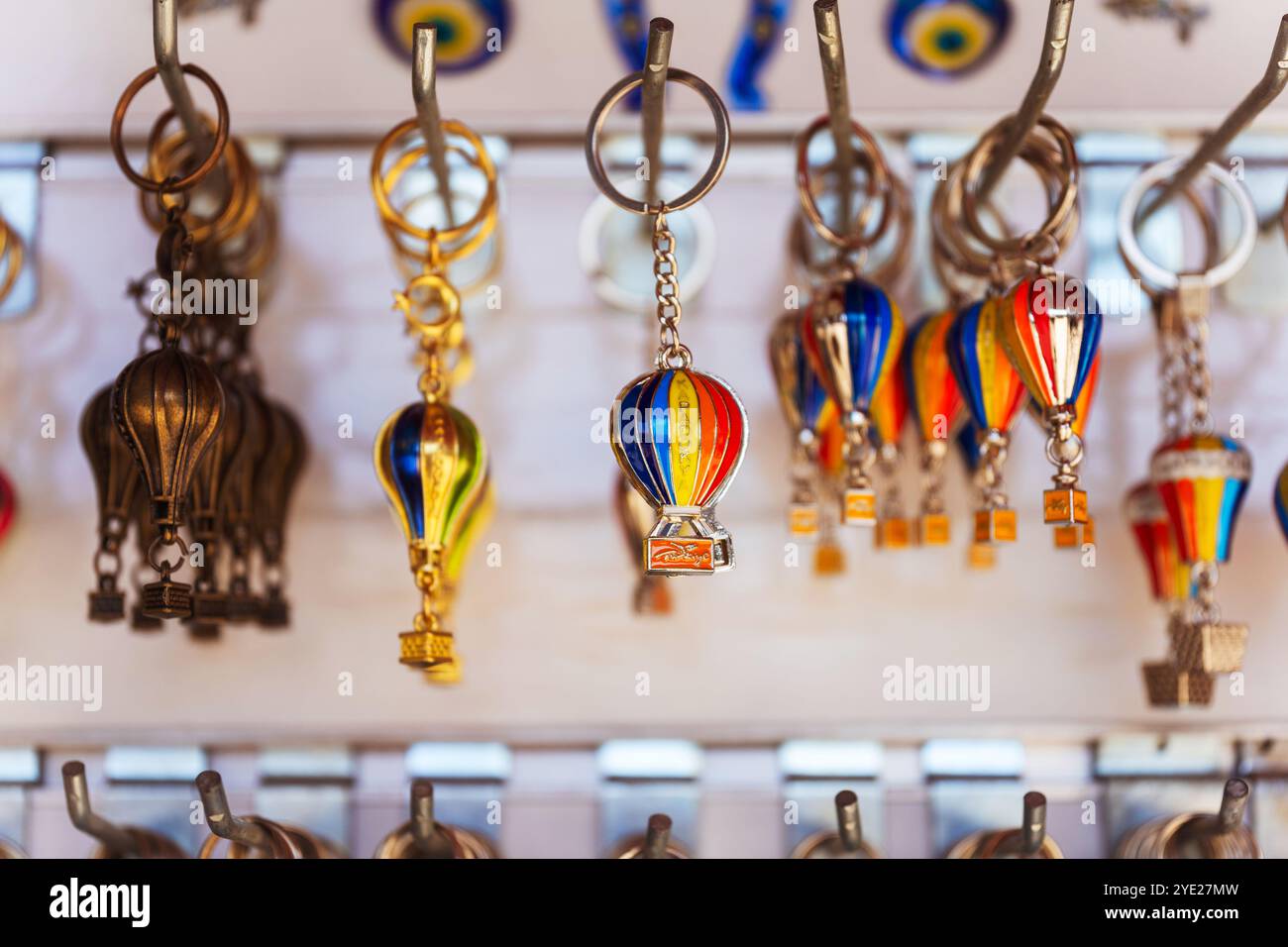 Colorful hot air balloon keychains beautifully hanging on a rack Stock ...
