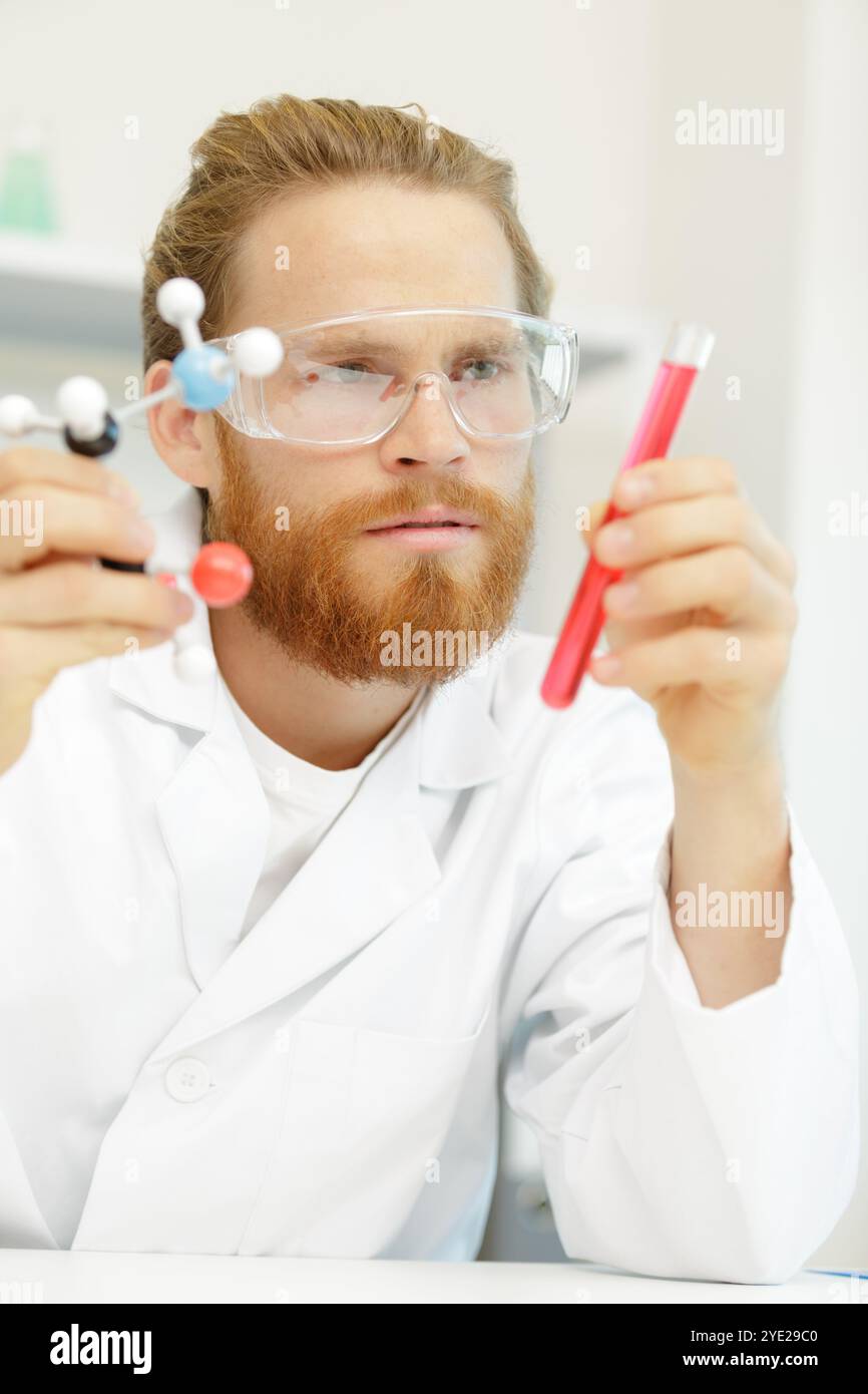 science formula with blood tube Stock Photo - Alamy