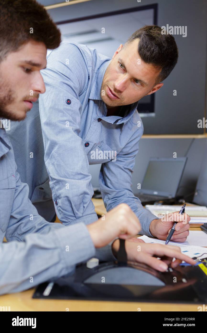 man pulling security alert system Stock Photo - Alamy