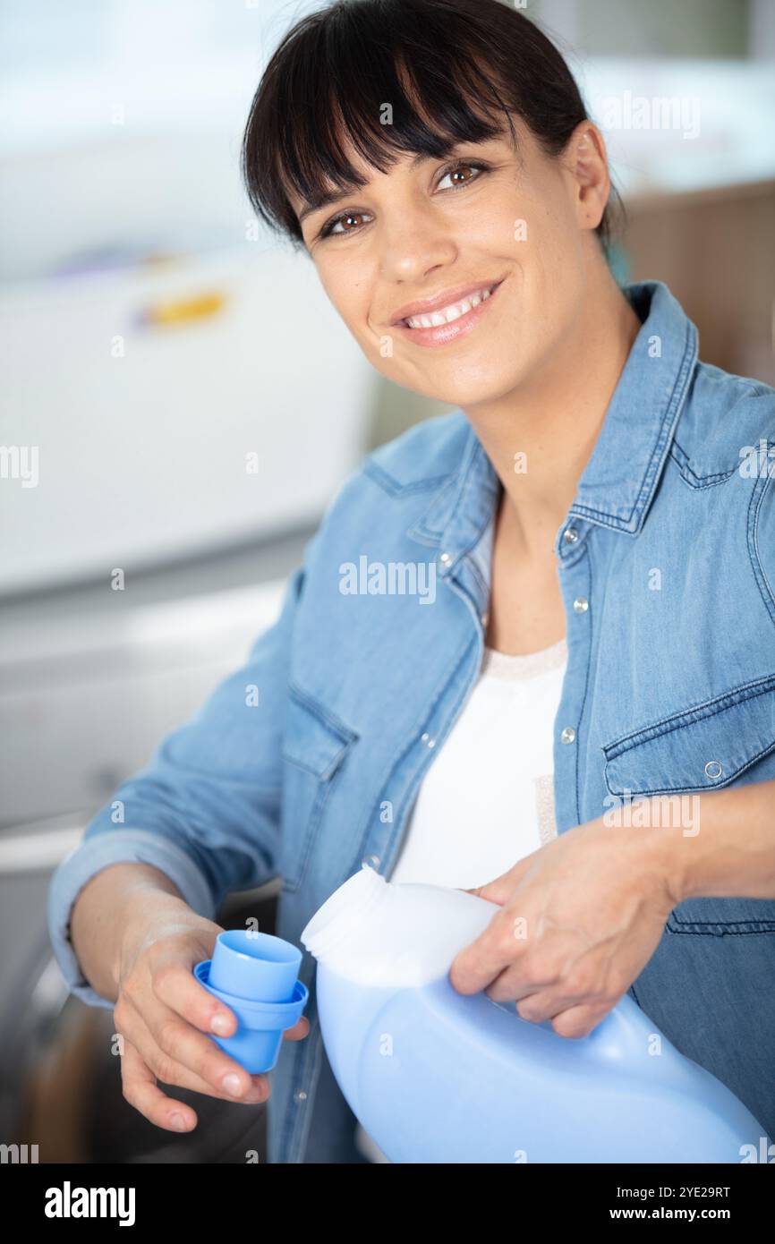 Pouring liquid laundry soap hi-res stock photography and images - Alamy