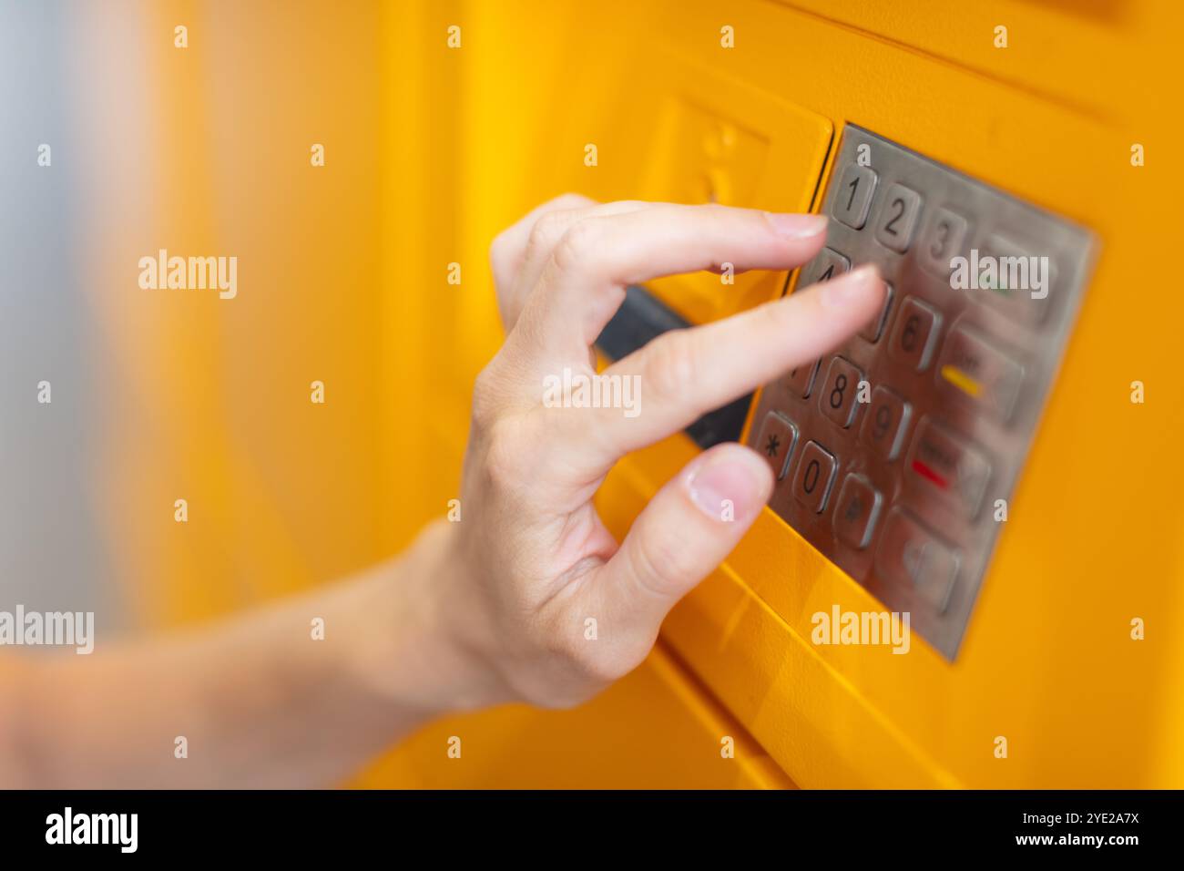 woman using atm machine to withdraw her money Stock Photo - Alamy