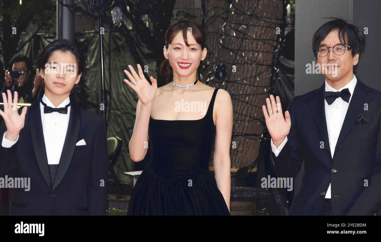 Japanese actress Haruka Ayase (center) appeares on the red carpet in Chiyoda Ward, Tokyo on ...