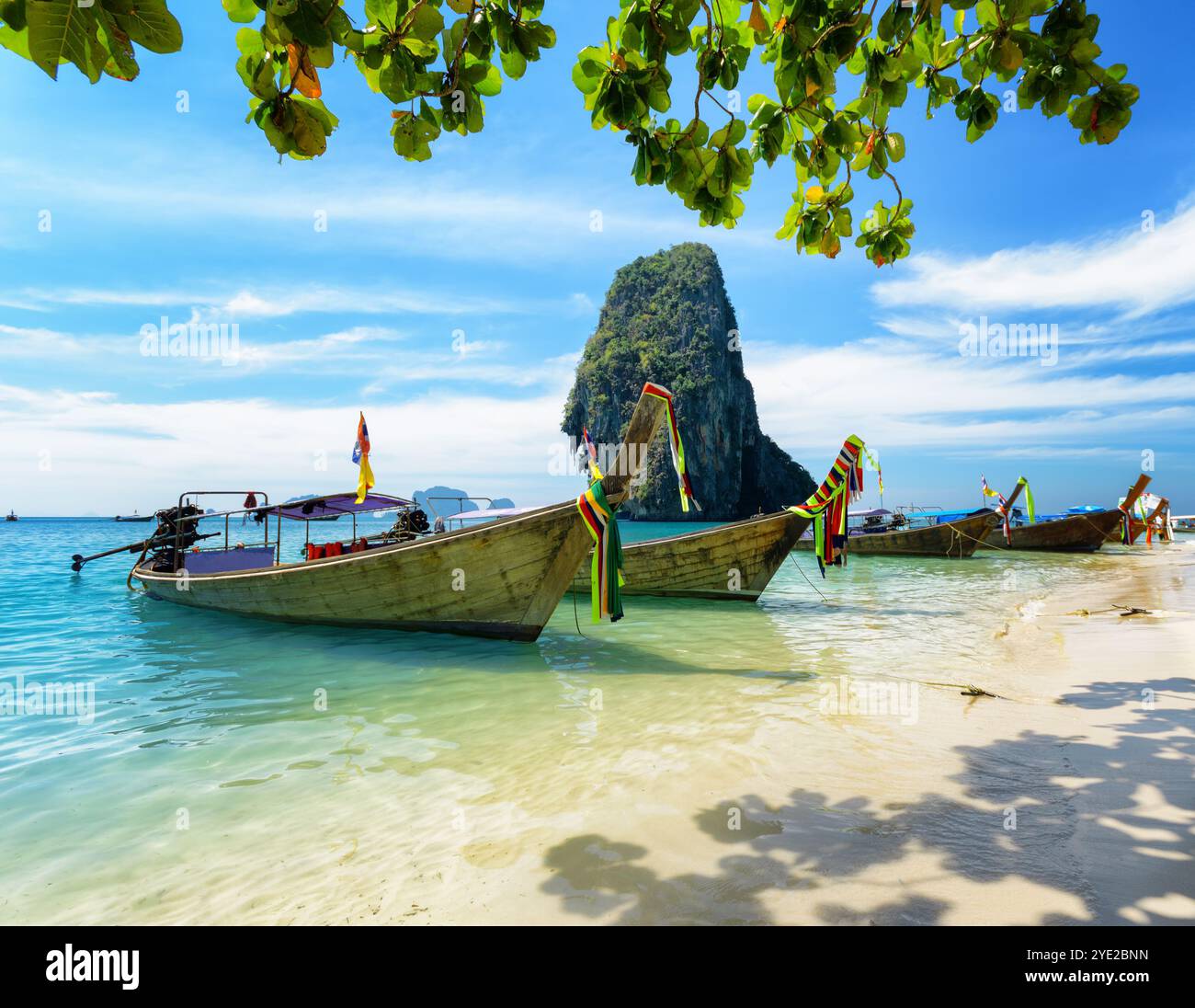 Thai boats on Phra Nang beach, Thailand Stock Photo - Alamy