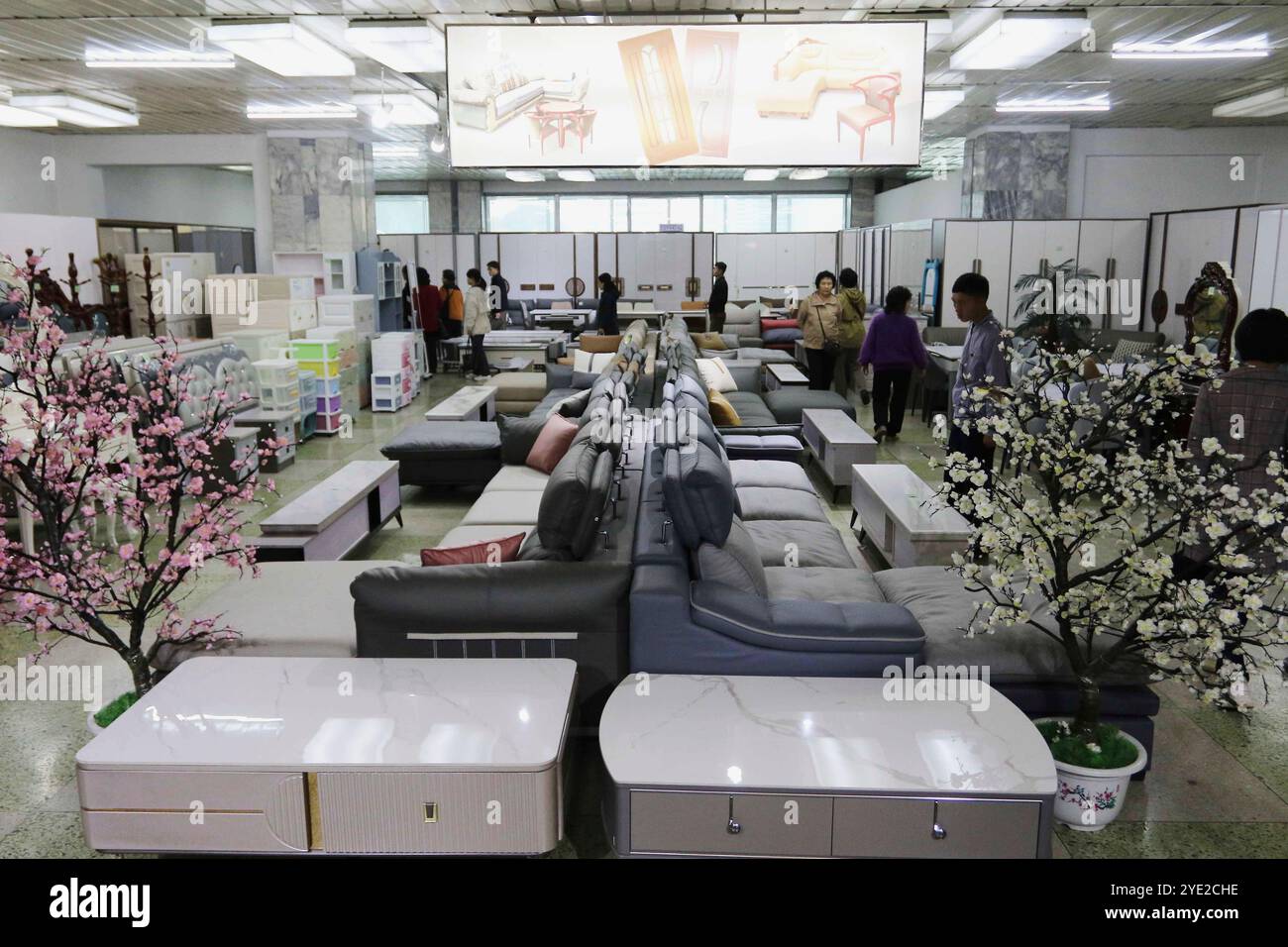 Pyongyang citizens look at sofas exhibited in the 15th Commodity ...