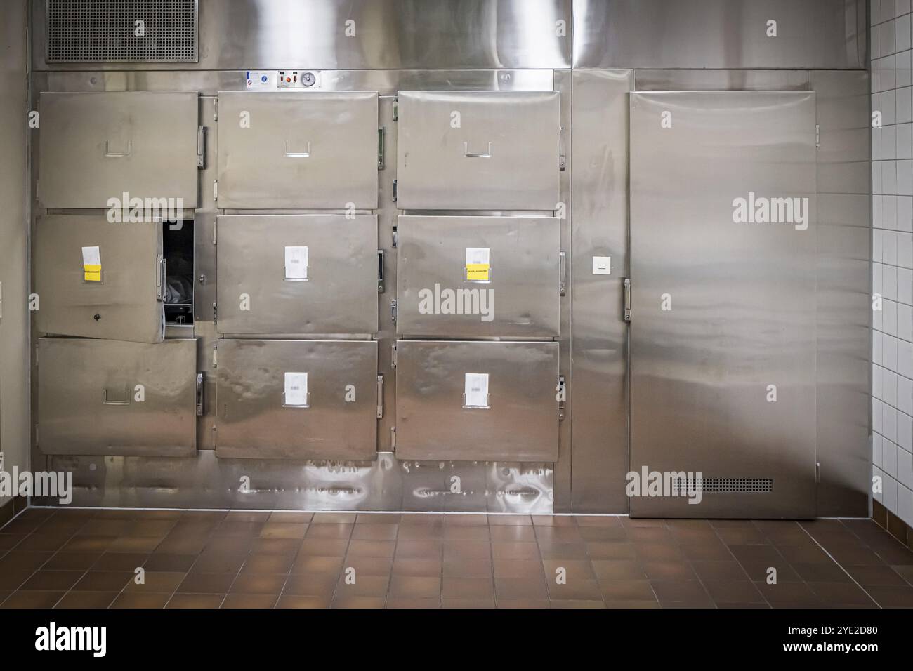 Hospital, morgue, pathology, cold room with metal doors and sterile ...