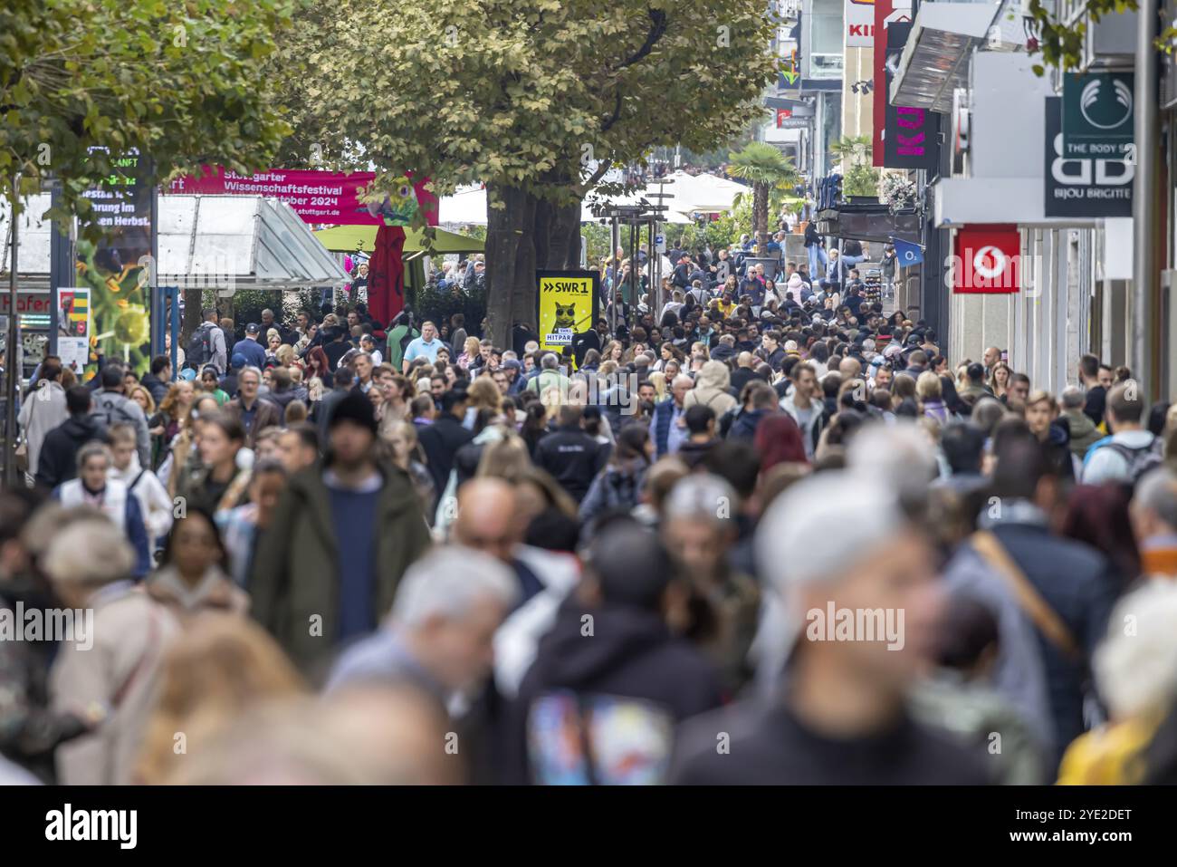 Crowd on the way in the pedestrian zone Koenigstrasse, shopping street ...