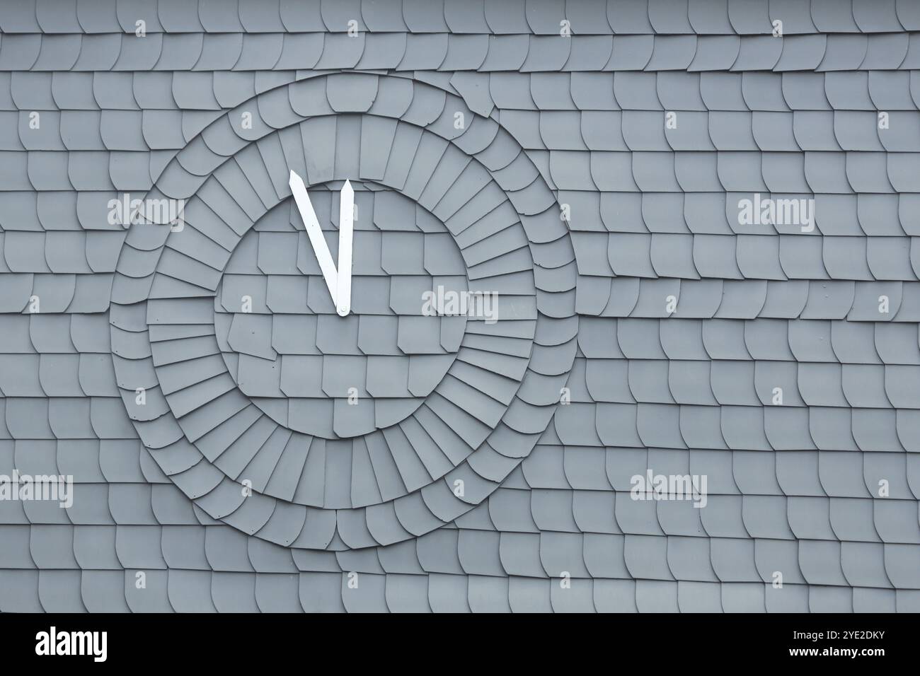 Slate wall with time, five minutes to twelve, symbol, time, clock ...