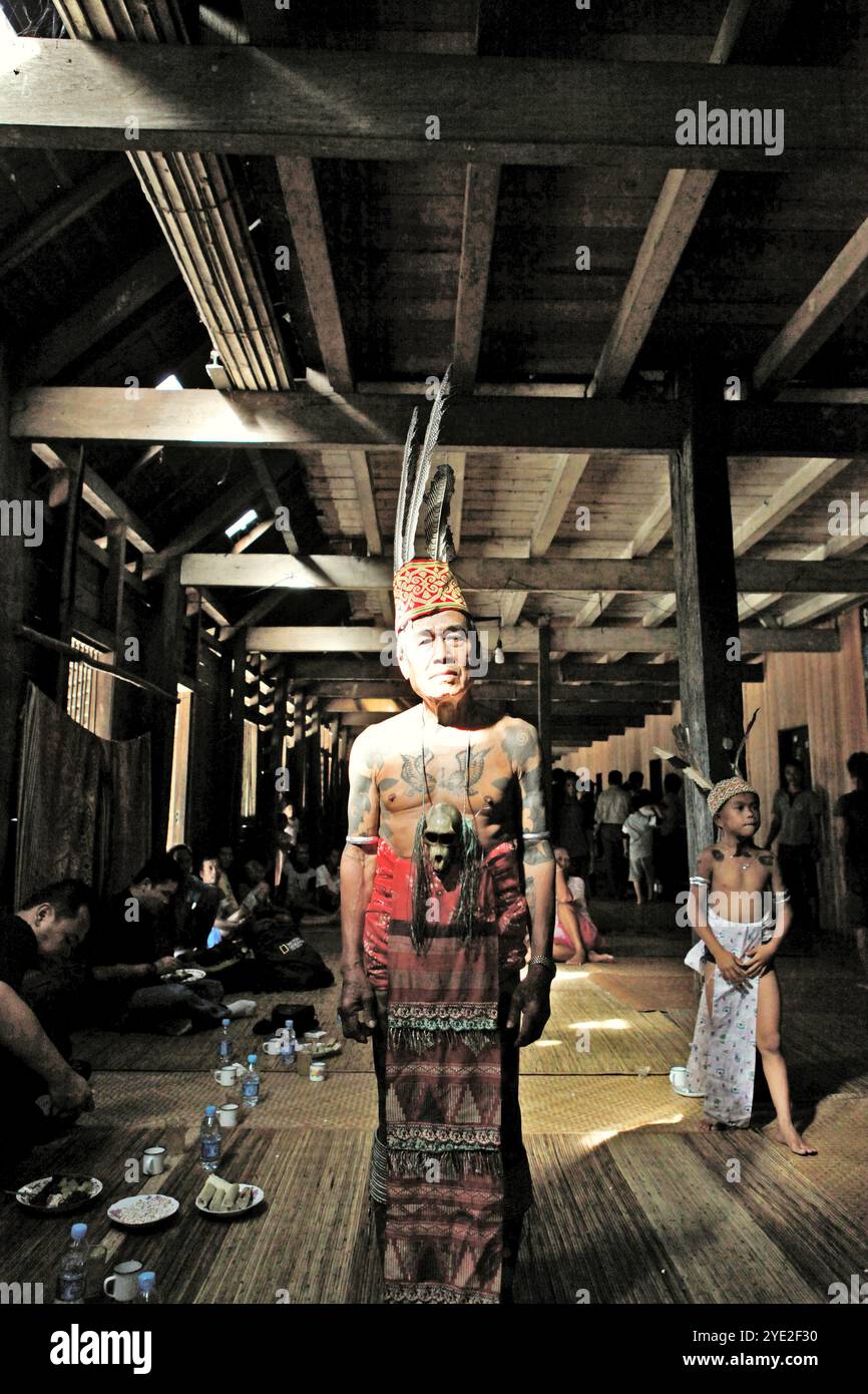 Portrait of Ramping, an elder, in traditional attire after the welcome ...