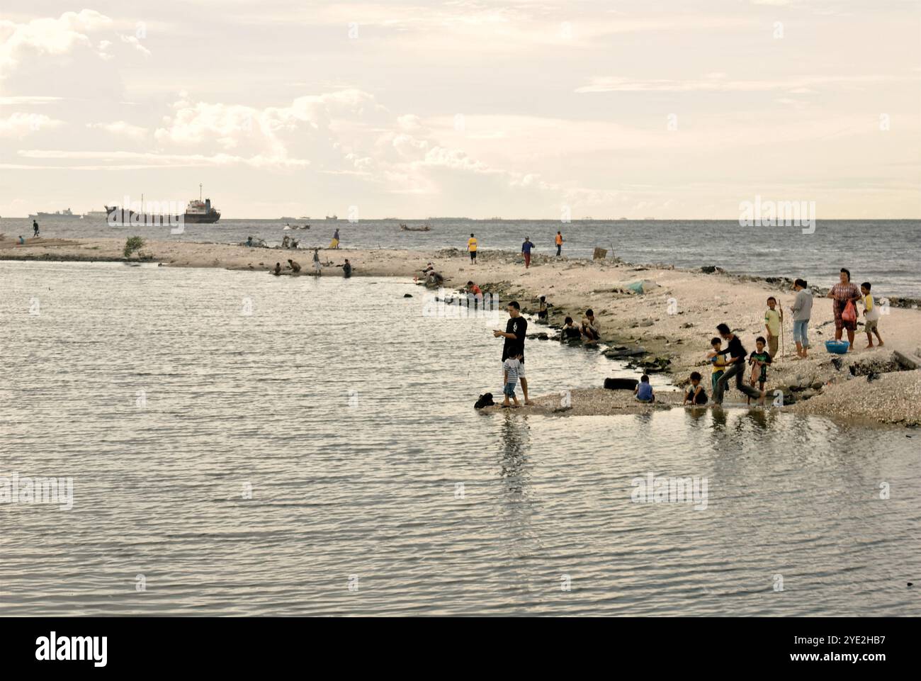 People having recreational activities on a man-made beach Stock Photo ...