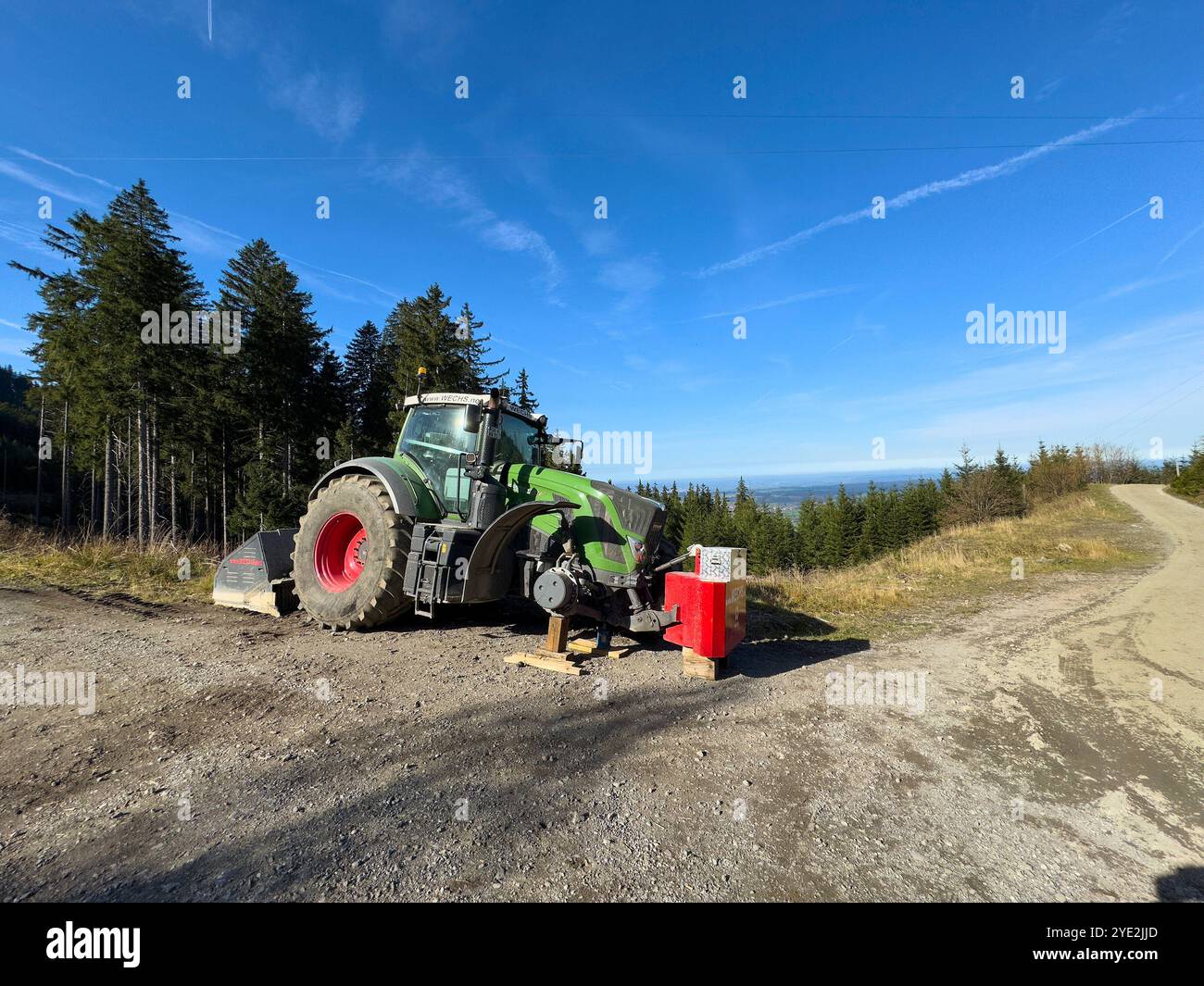 Fendt tractor with a flat tire on the way up to Edelsberg mountain in ...