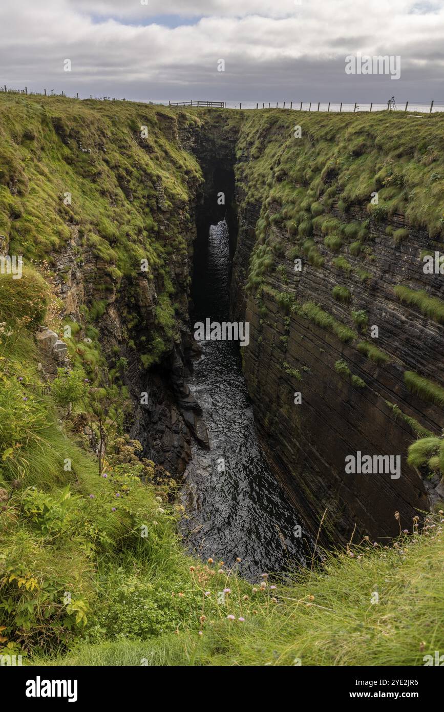The Gloup, collapsed cave with small waterfall, Mull Head Local Nature ...
