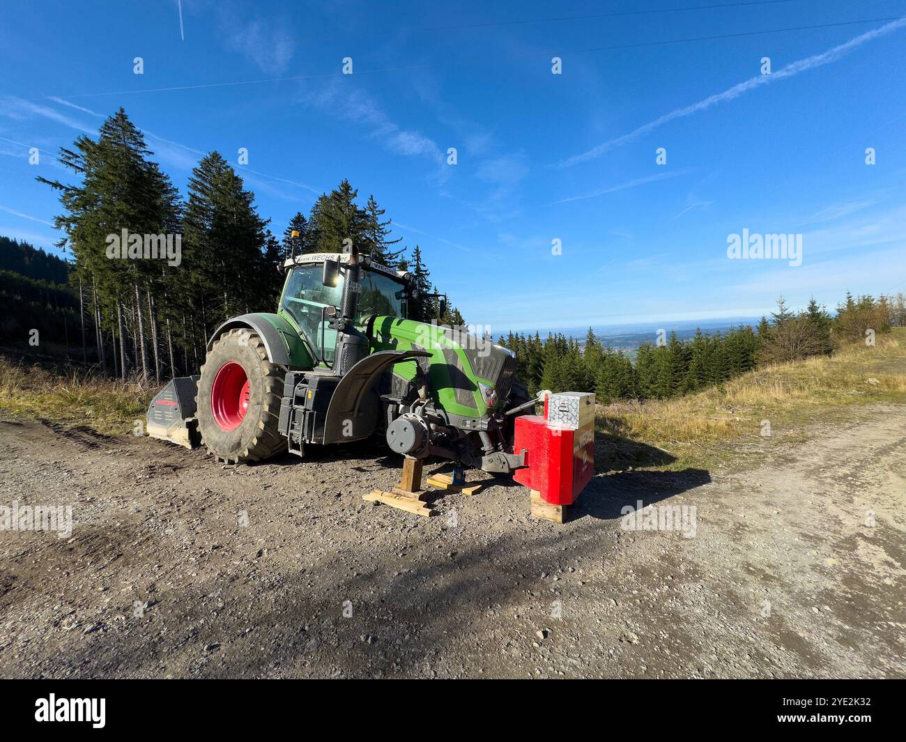 Fendt tractor with a flat tire on the way up to Edelsberg mountain in ...