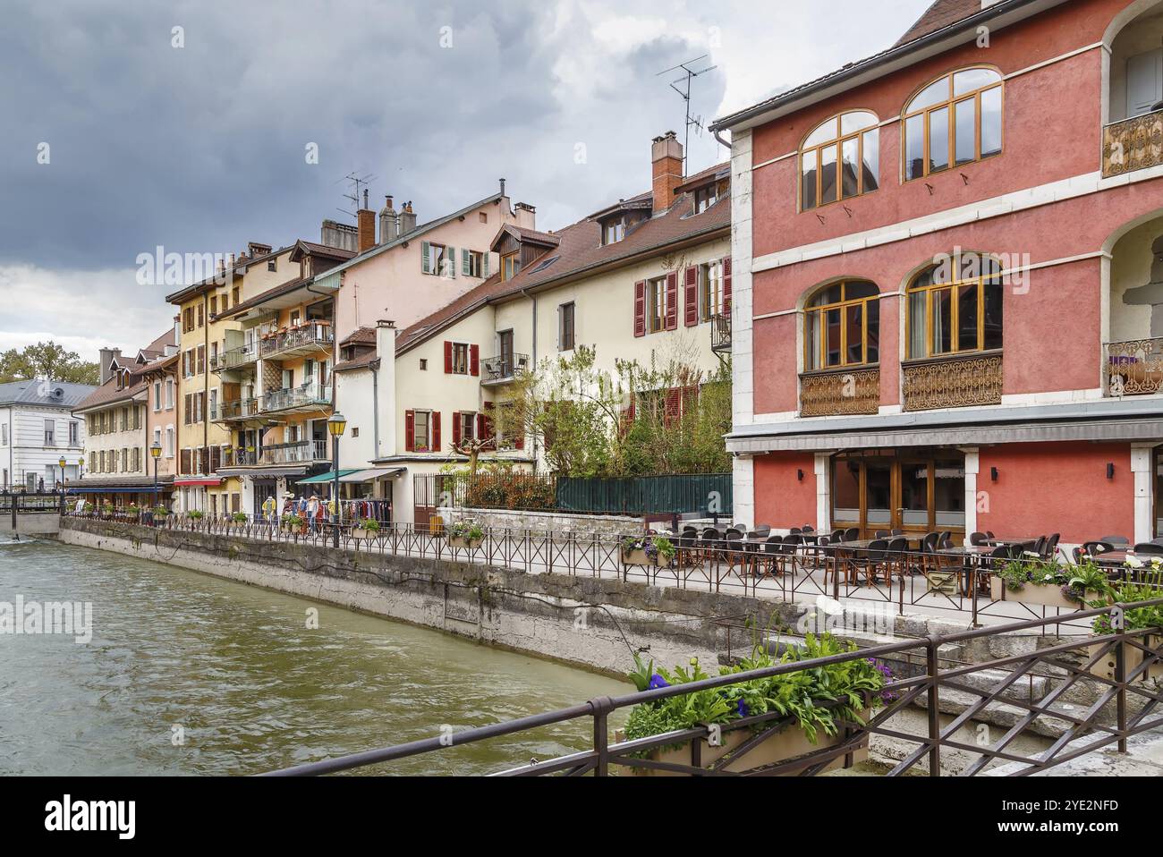 Historic houses along the Thiou river in Annecy old town, France ...