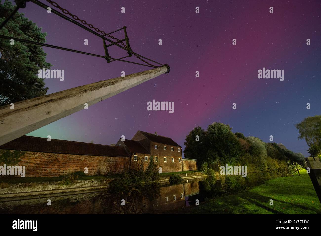 Northern Lights (Aurora Borealis) above the historic crane next to the ...
