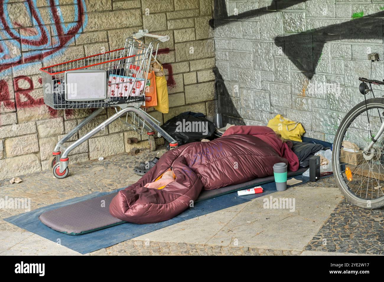 Homeless man sleeping in hut in park, Tiergarten, Mitte, Berlin ...