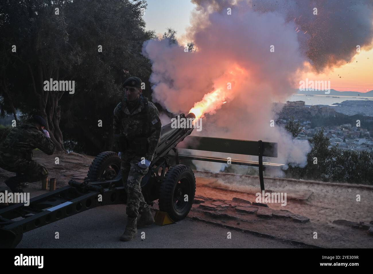 Athens, Greece. 28 October 2024. Greek soldiers fire a cannon over the ...