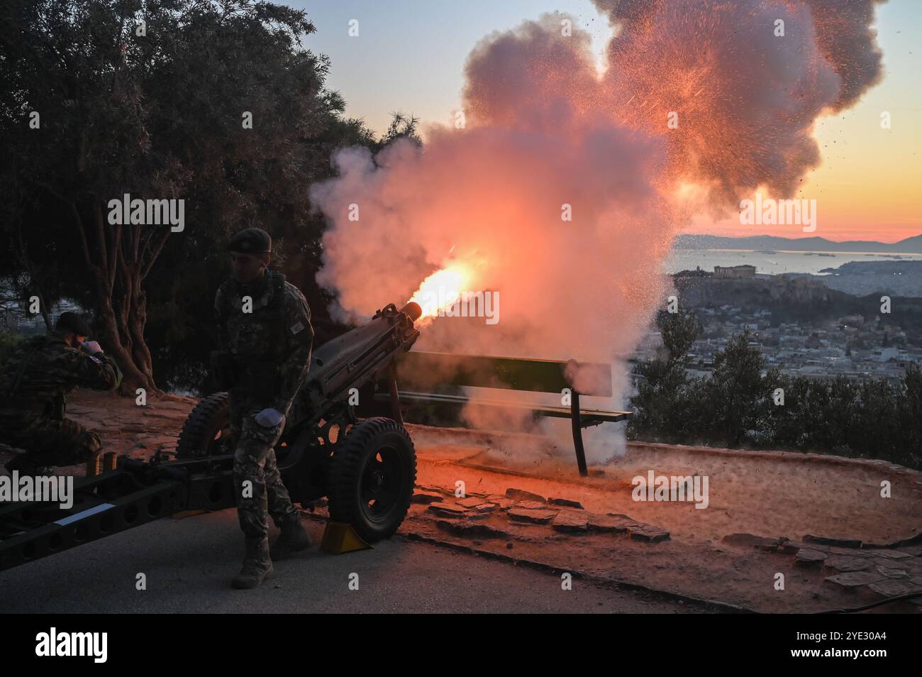 Athens, Greece. 28 October 2024. Greek soldiers fire a cannon over the ...