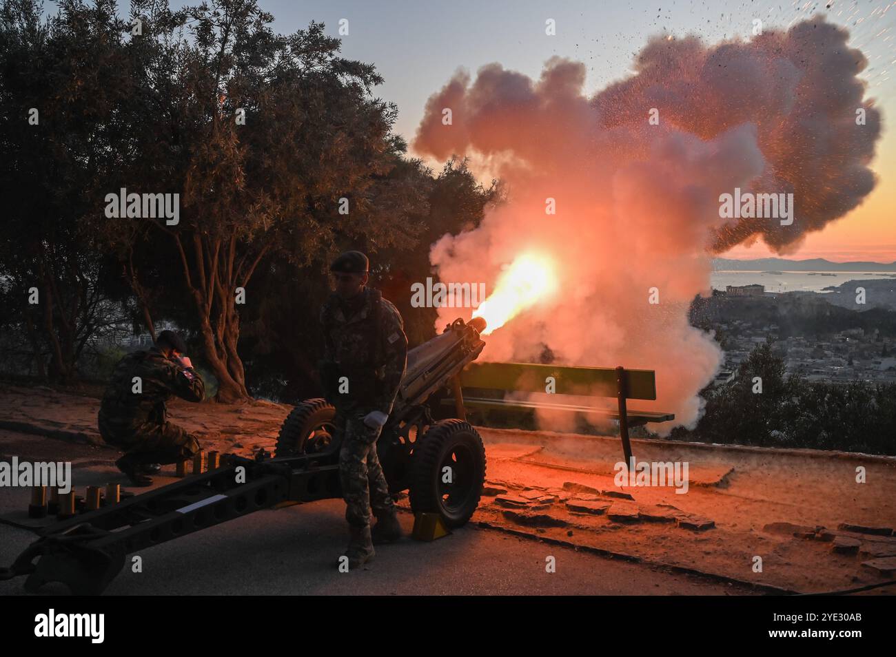 Athens, Greece. 28 October 2024. Greek soldiers fire a cannon over the ...