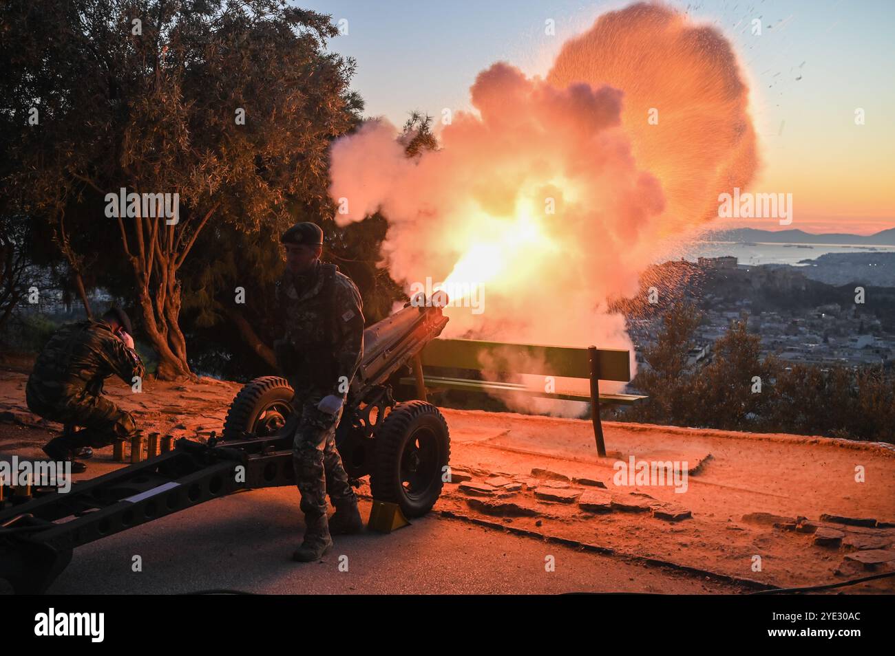 Athens, Greece. 28 October 2024. Greek soldiers fire a cannon over the ...