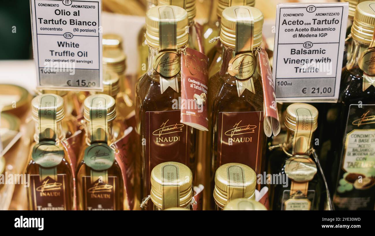 Visitors explore a variety of truffle products, including oils and ...