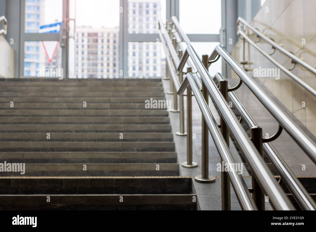 A beautifully designed set of stairs featuring a modern stainless steel ...
