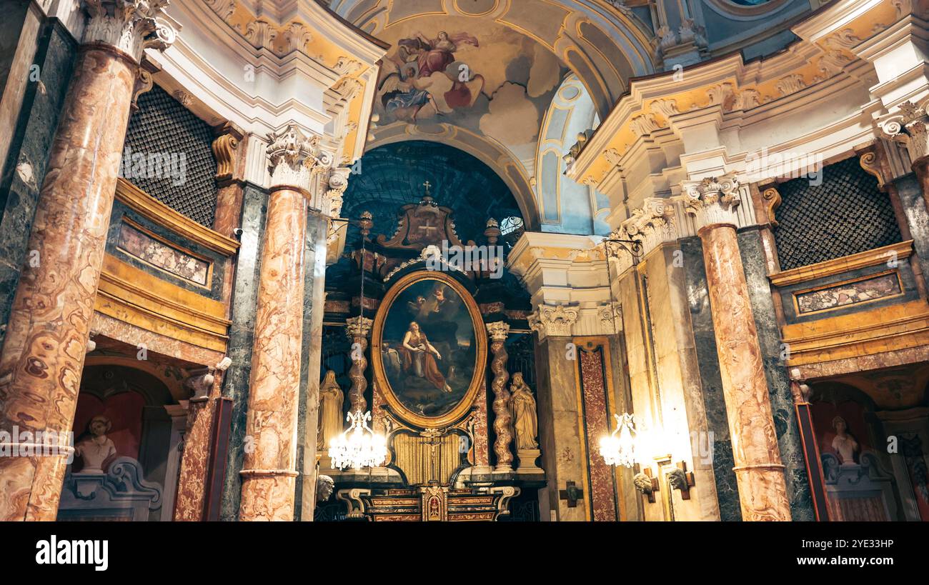 The interior of a historic church in Alba features beautiful columns ...
