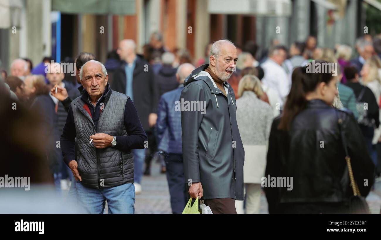 Pedestrians walking through lively urban hi-res stock photography and ...
