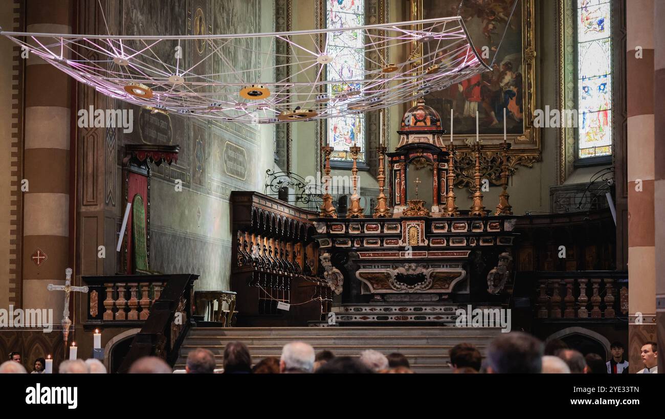 In a historic church in Alba, Italy, a beautifully decorated altar ...