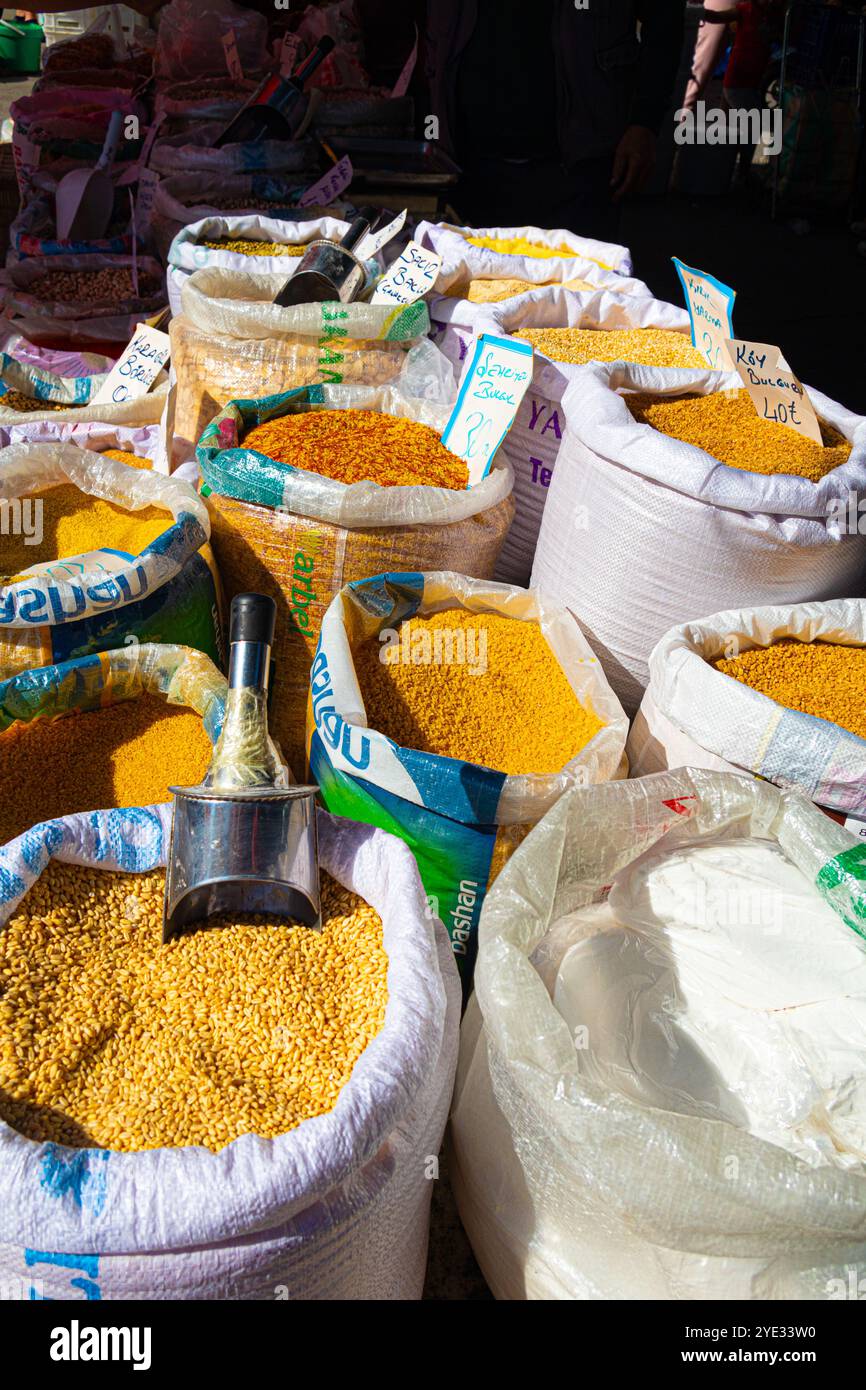 A display of open sacks of bulgur wheat for sale in Turkish market Foca ...