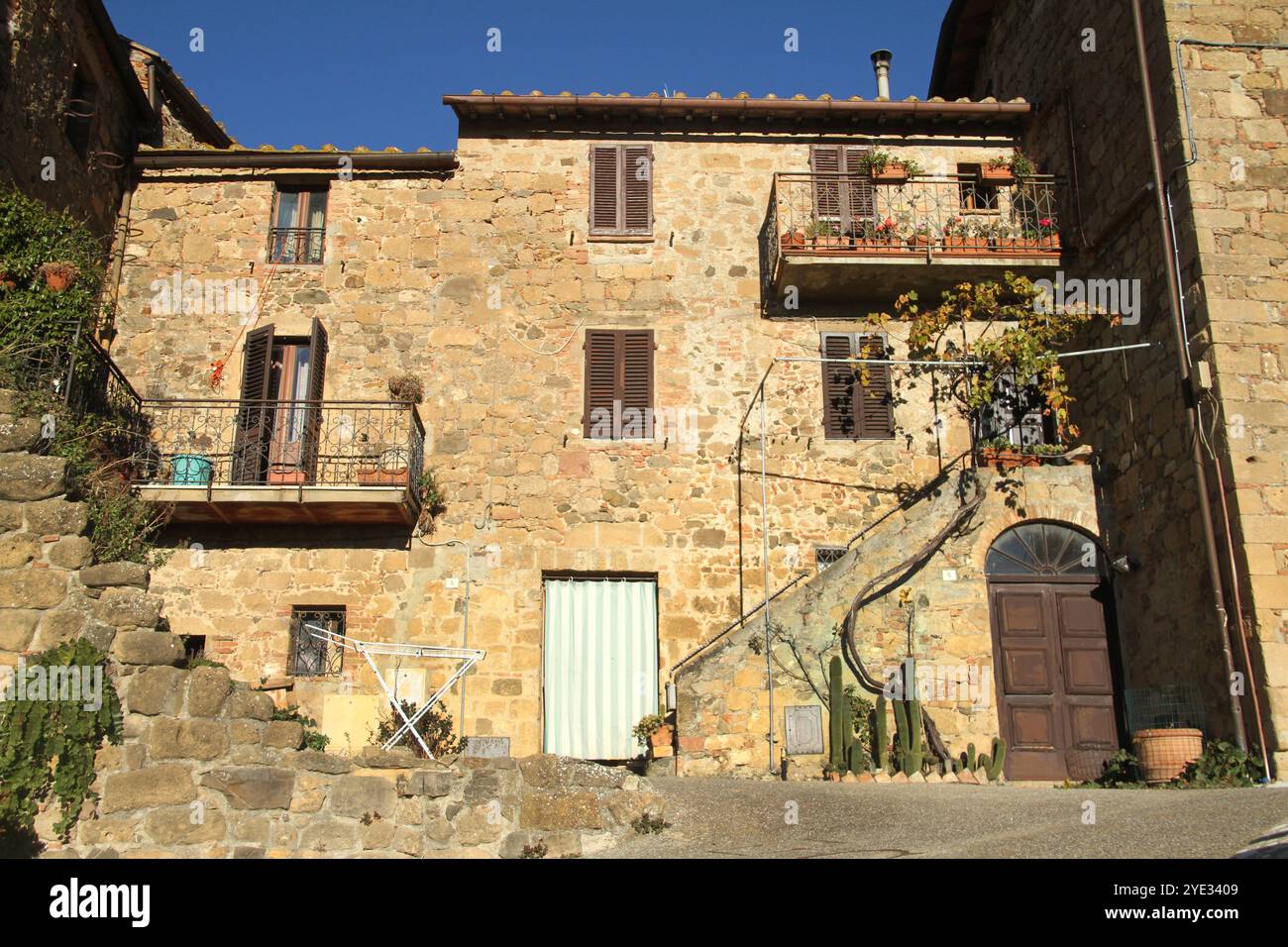 Old residential building in the picturesque medieval village of ...