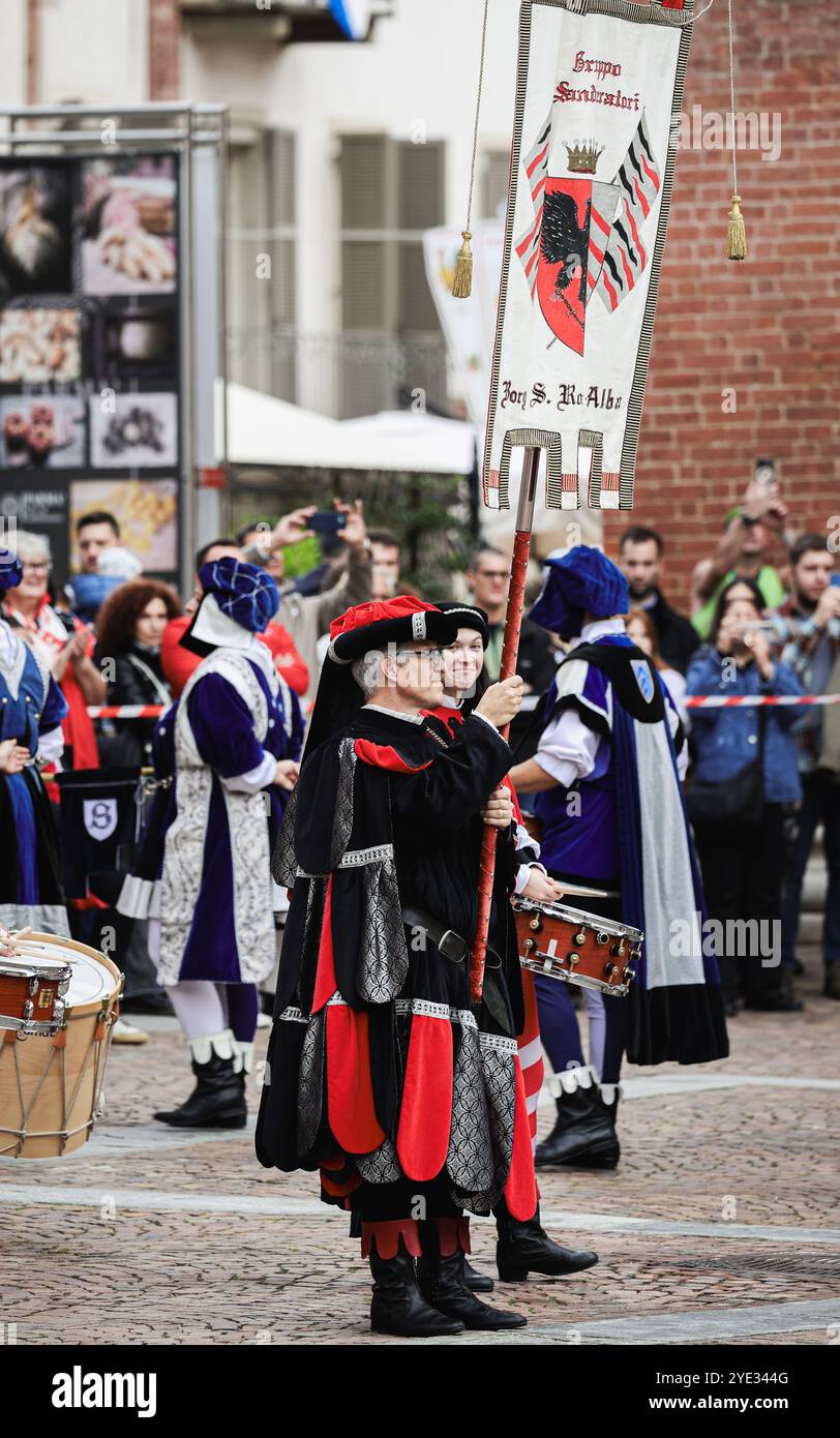 Dressed in vibrant historical costumes, parade participants celebrate a ...