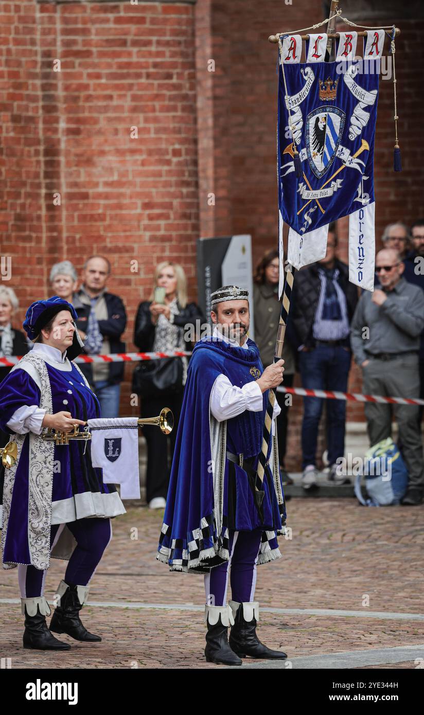 Participants in traditional costumes take part in a historical parade ...