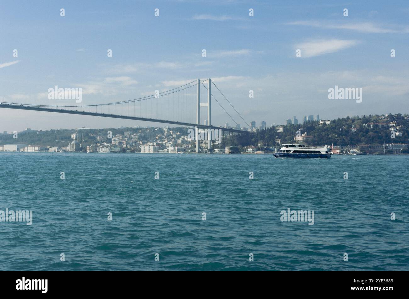 Iconic istanbul skyline ferry crossing under the boğaz bridge Stock ...