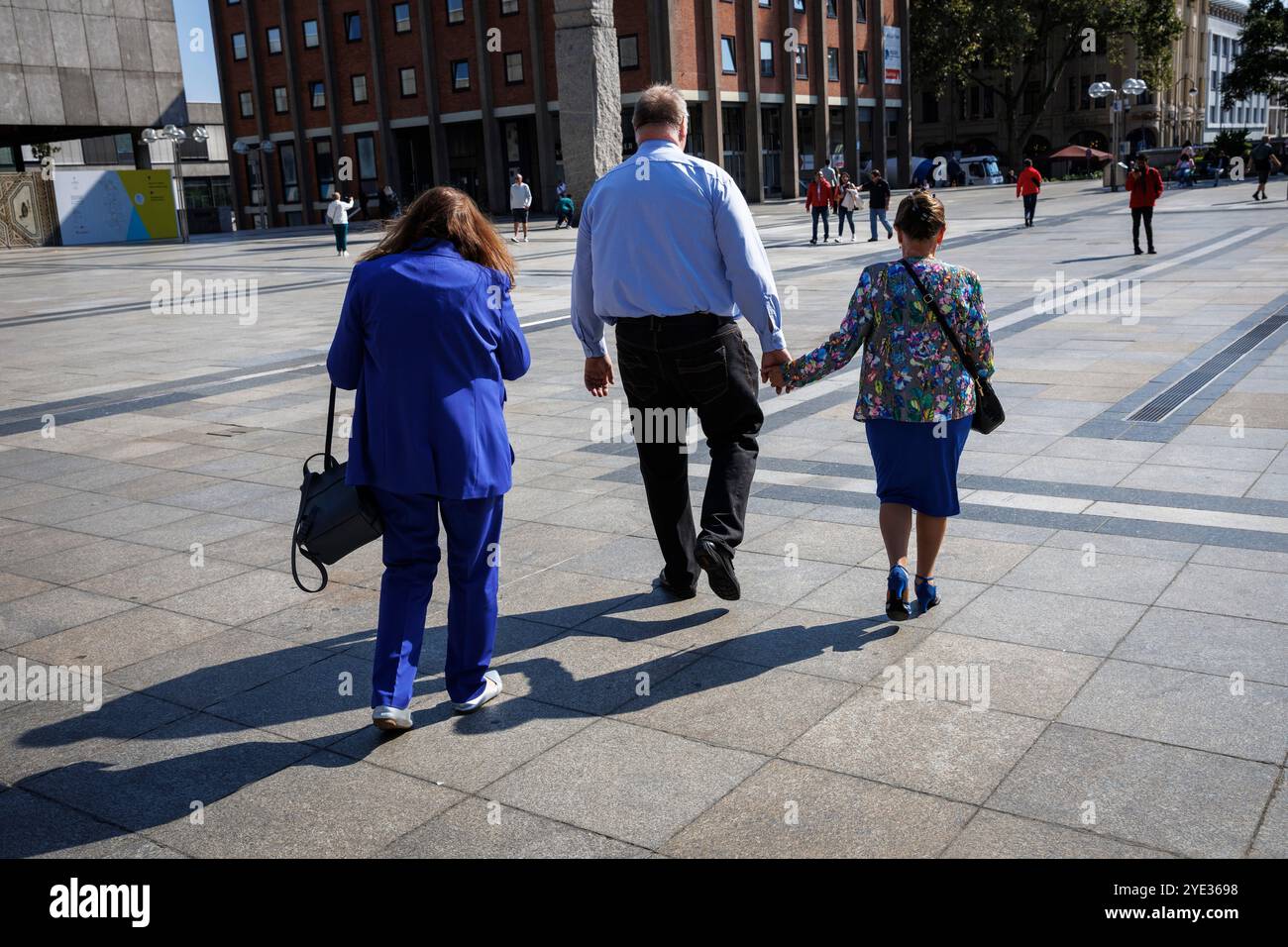 people on Roncalli square at the cathedral, Cologne, Germany. Menschen ...