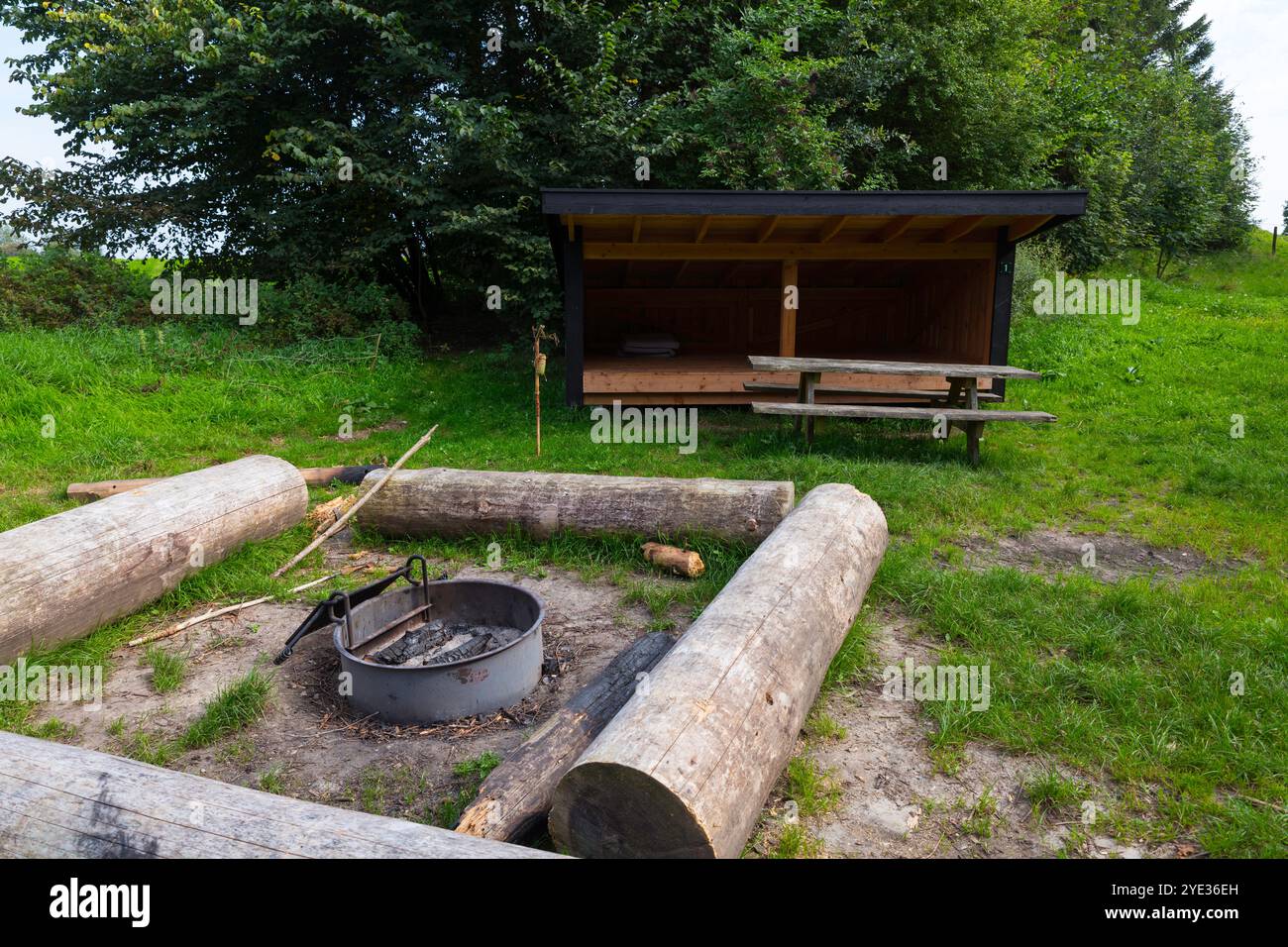 typical danish rustic Campsite With Wooden Shelter and Fire Pit Stock ...