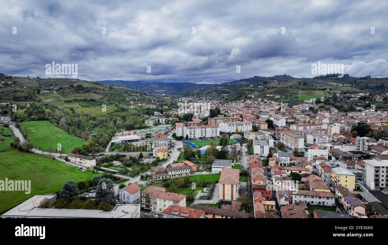 This breathtaking landscape captures the vibrant town of Alba in Italy ...